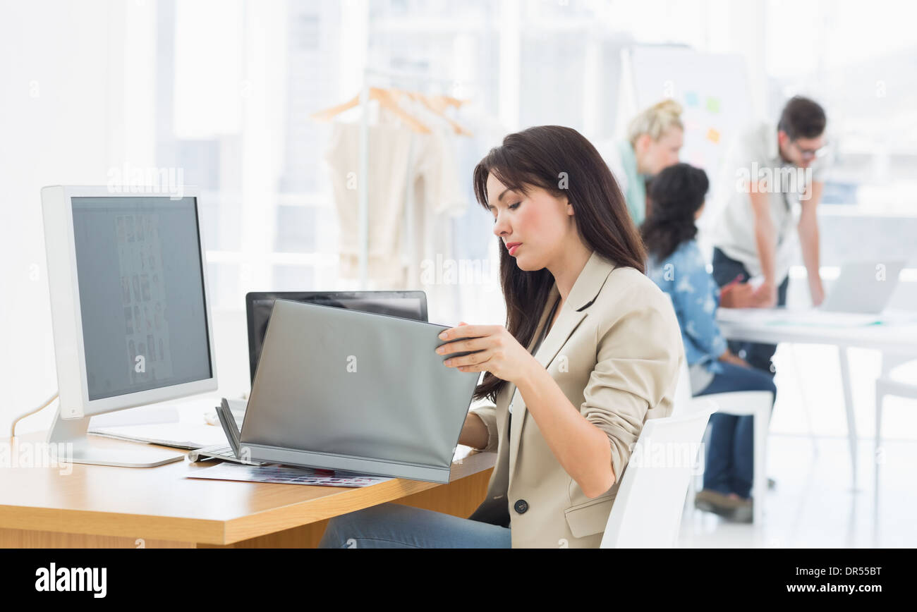 Woman behind desk hi-res stock photography and images - Alamy