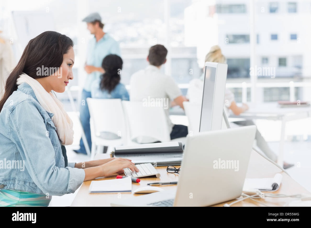 Woman behind computer hi-res stock photography and images - Alamy