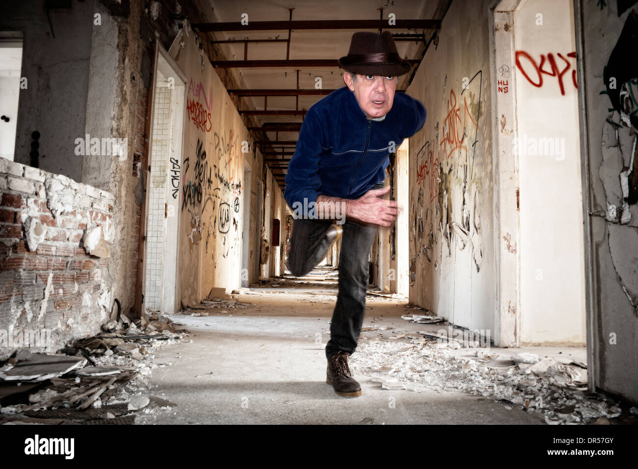 Man running scared hi-res stock photography and images - Alamy