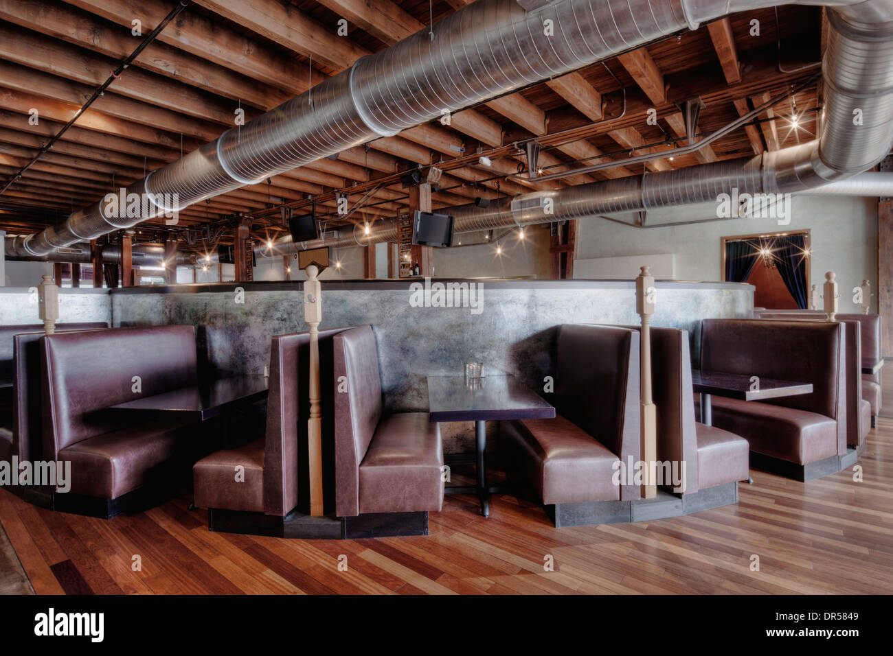 Tables and chairs in empty restaurant Stock Photo - Alamy