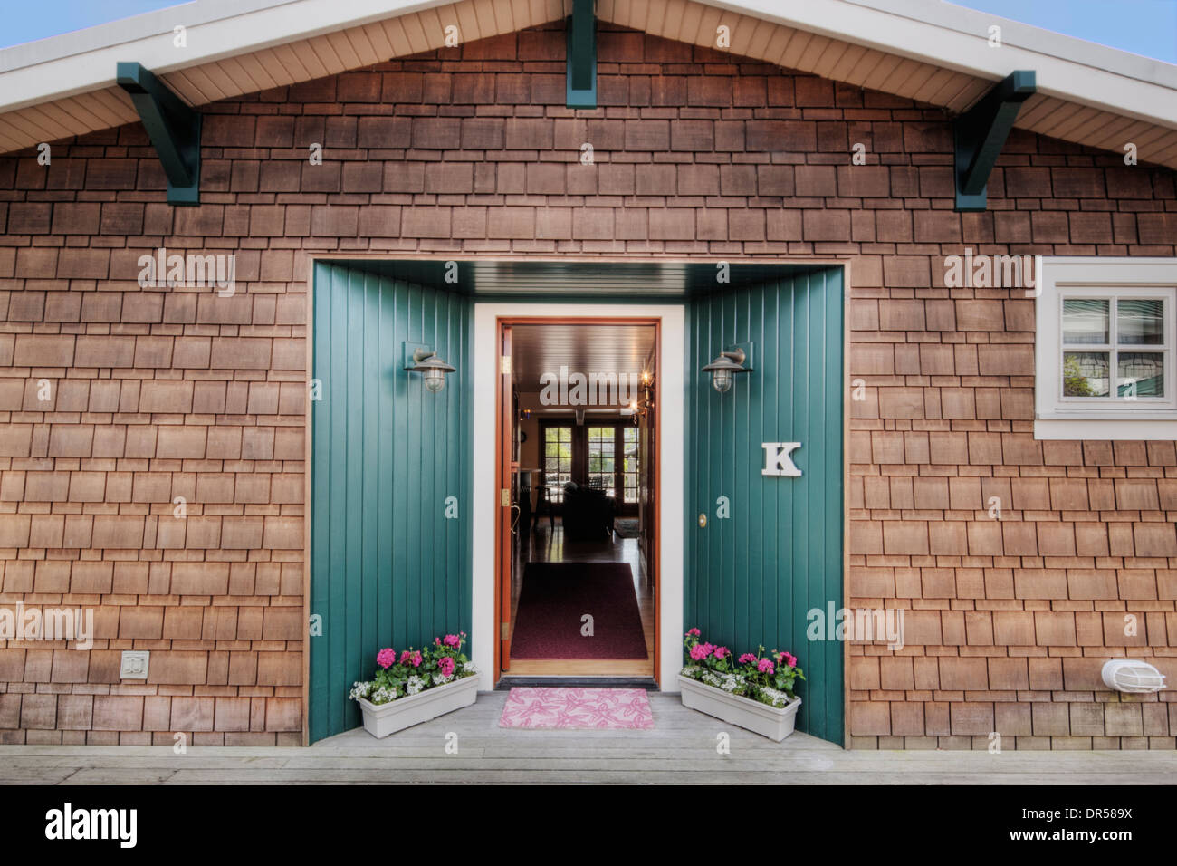 Open front door of wooden house Stock Photo - Alamy