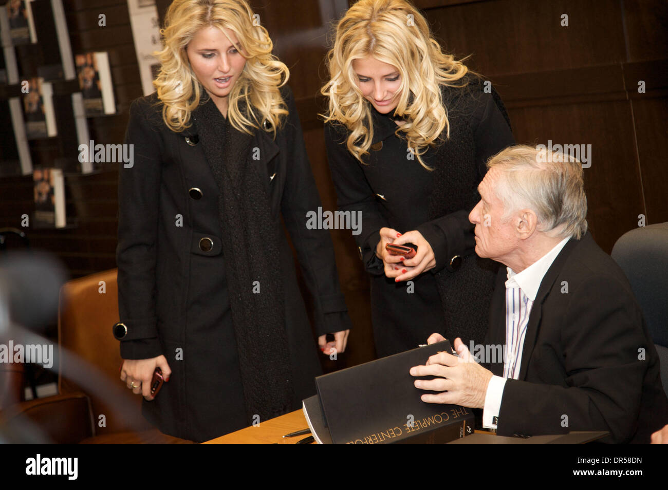 Hugh hefner signing hi-res stock photography and images - Alamy