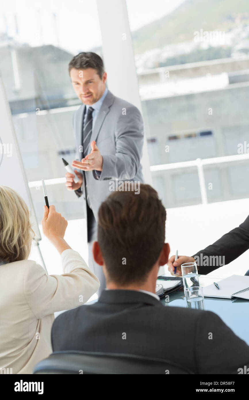 Business people in office at presentation Stock Photo - Alamy