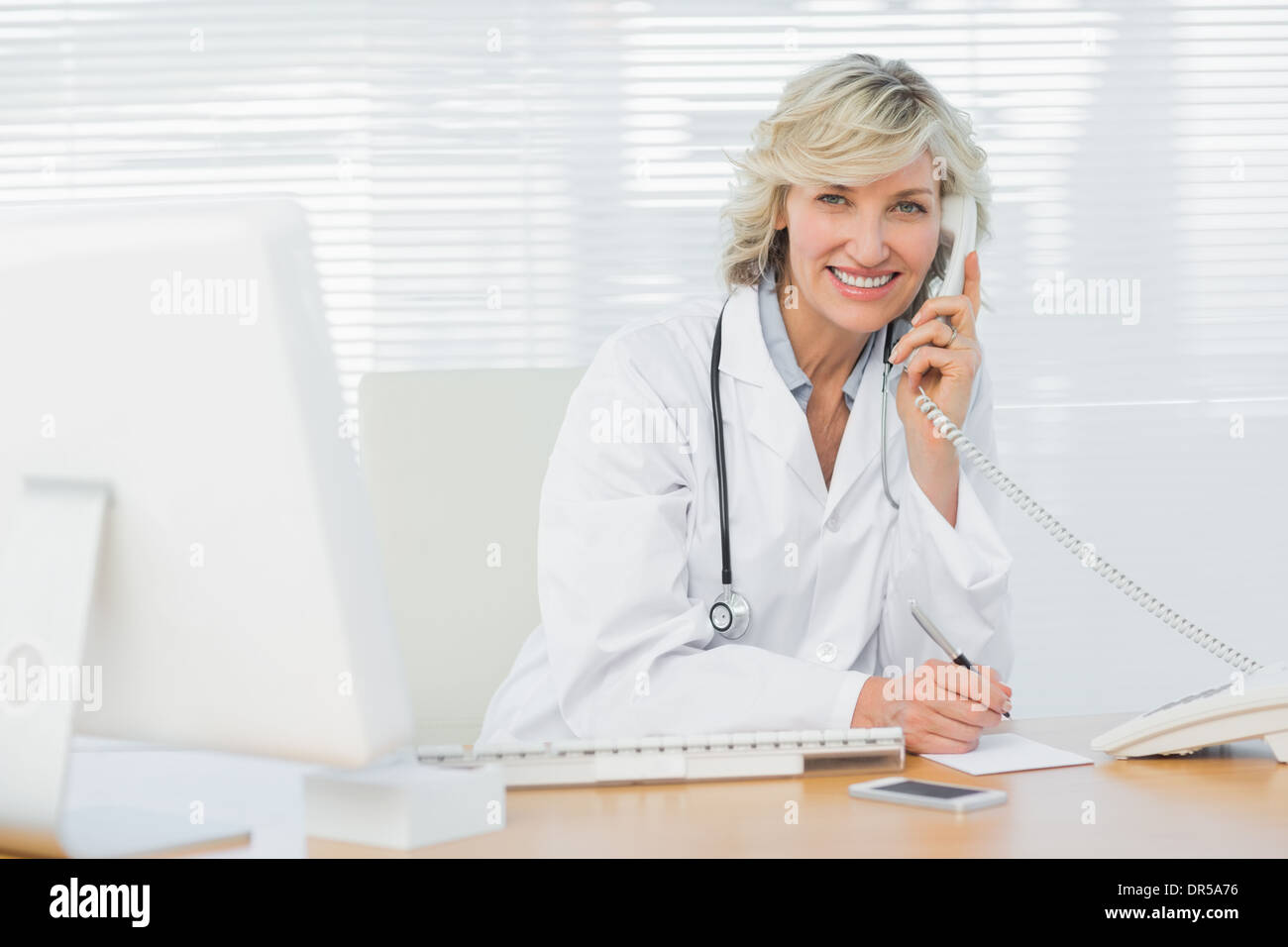 Doctor phone computer hi-res stock photography and images - Alamy