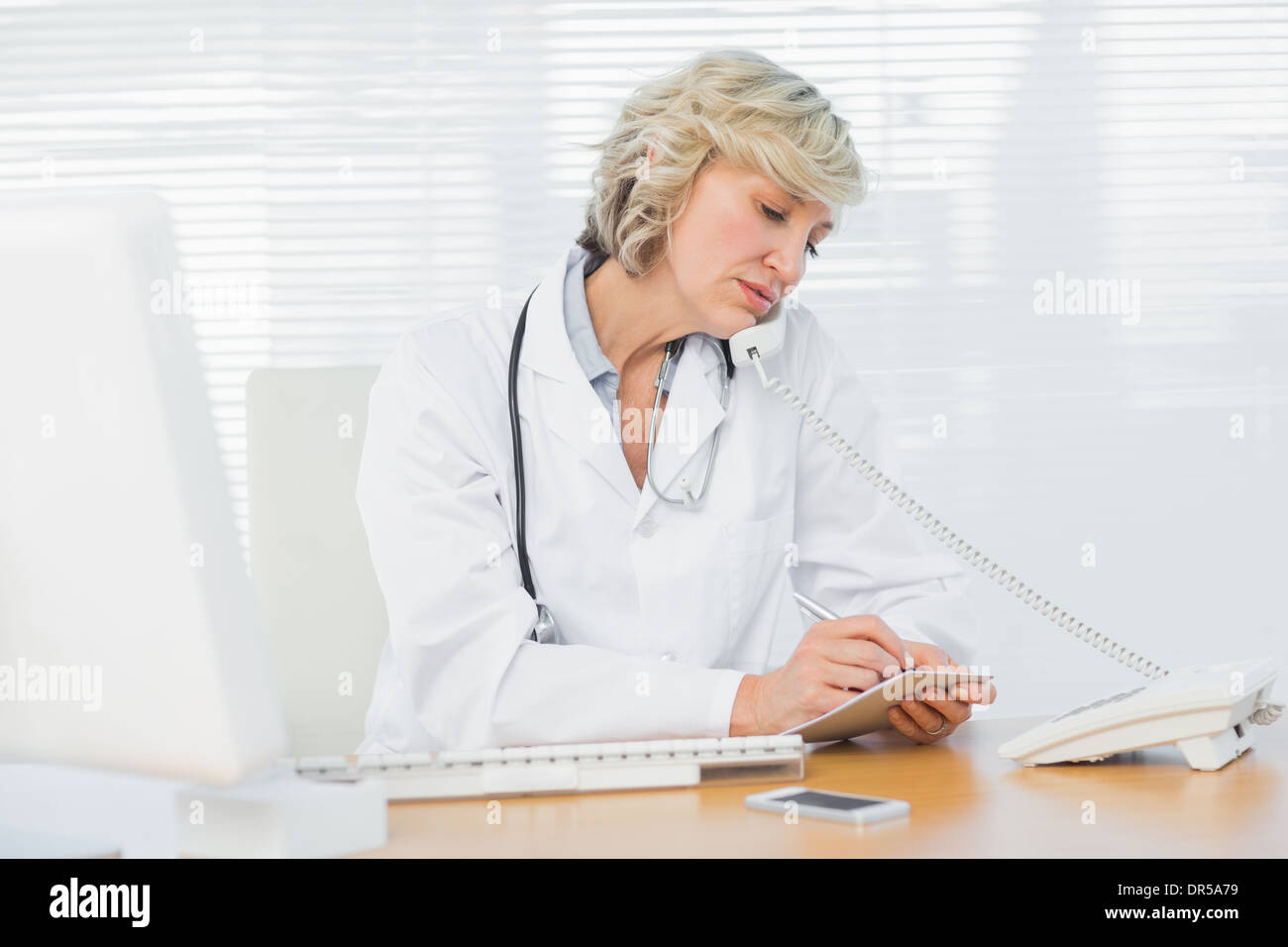 Female doctor computer notes hi-res stock photography and images - Alamy