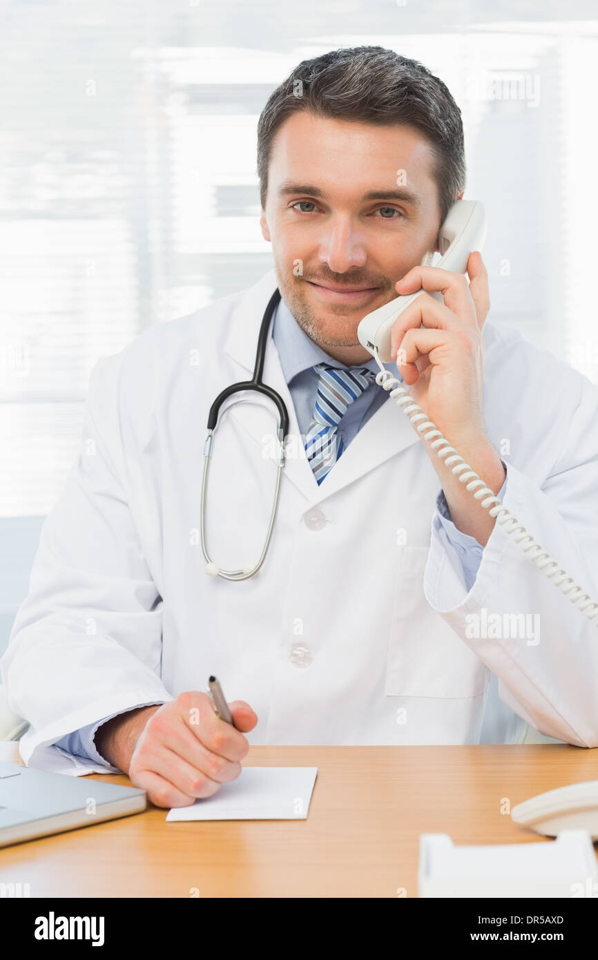 Doctor Writing Notes Desk High Resolution Stock Photography and Images ...