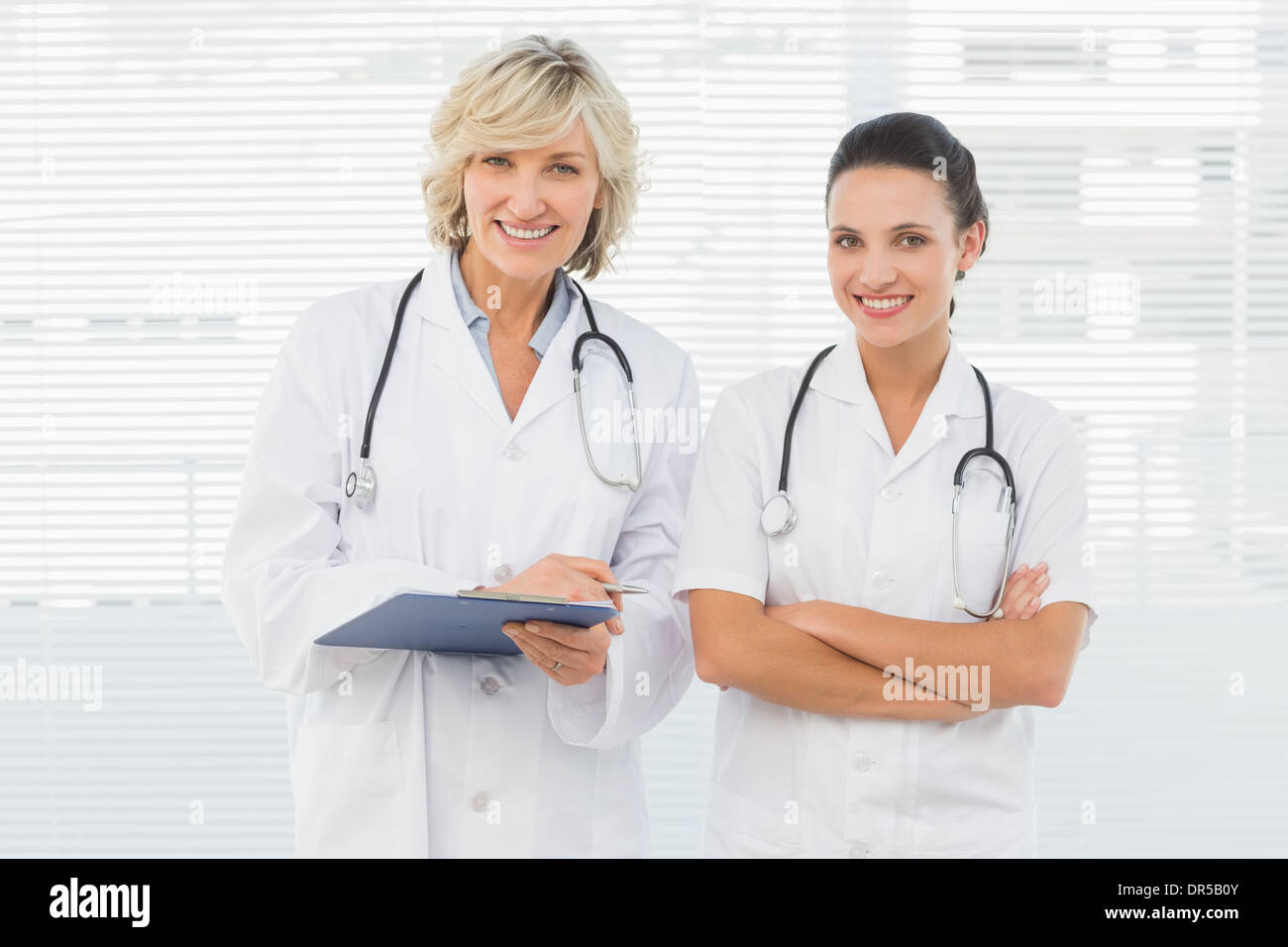 Portrait of two confident female doctors Stock Photo - Alamy