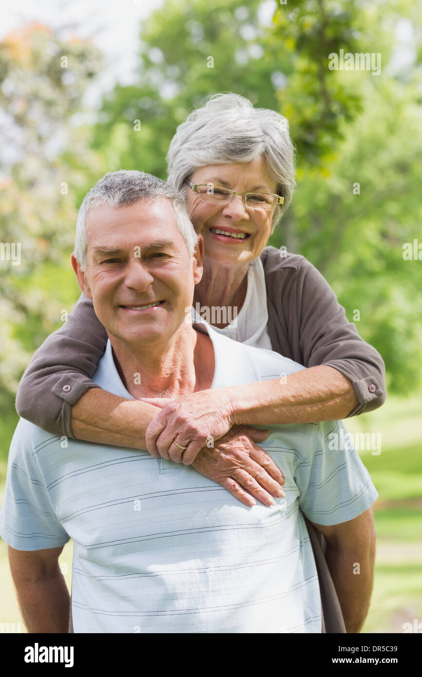 Couple from behind grass hi-res stock photography and images - Alamy