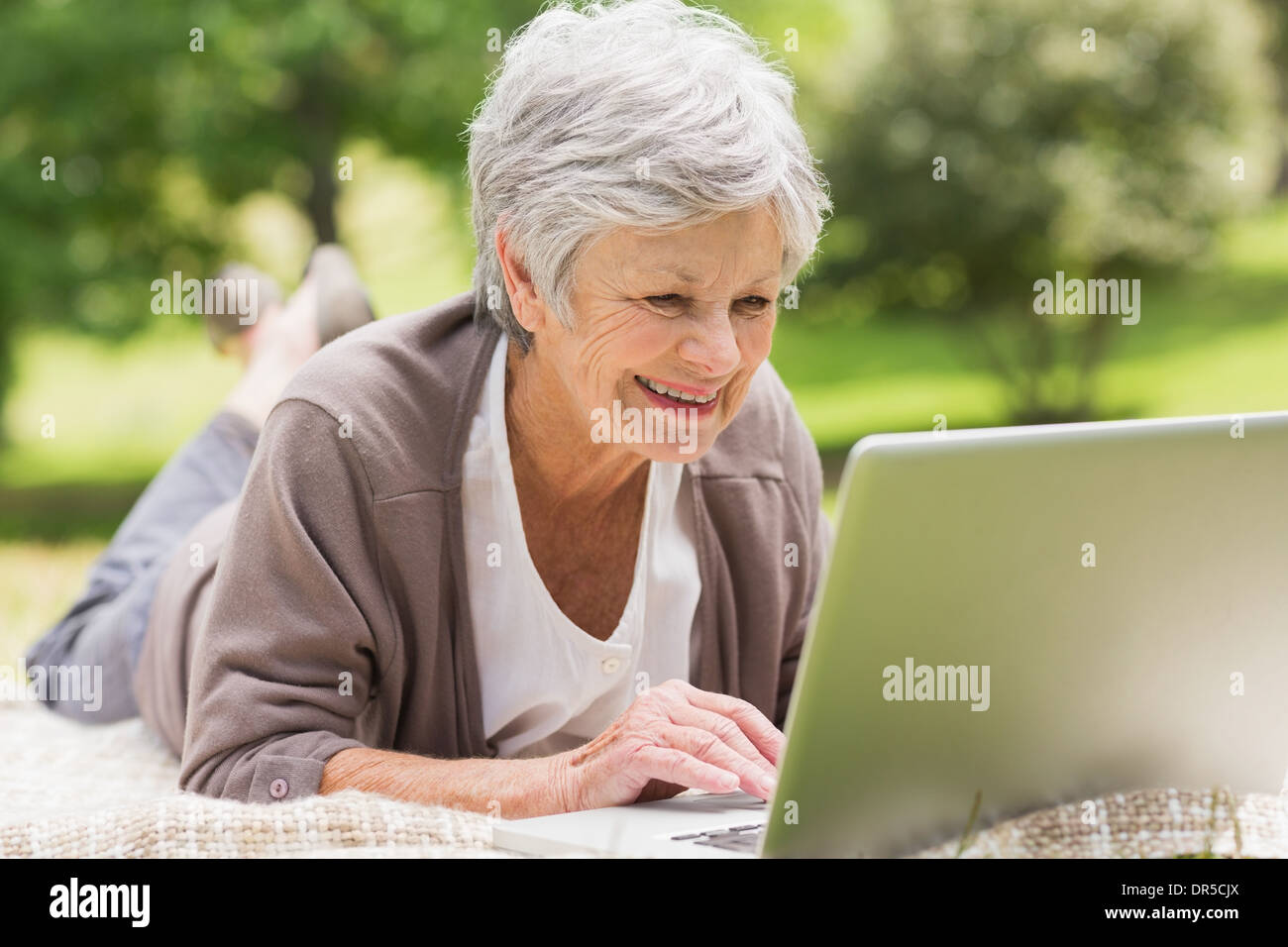 Mature woman summer laptop hi-res stock photography and images - Alamy