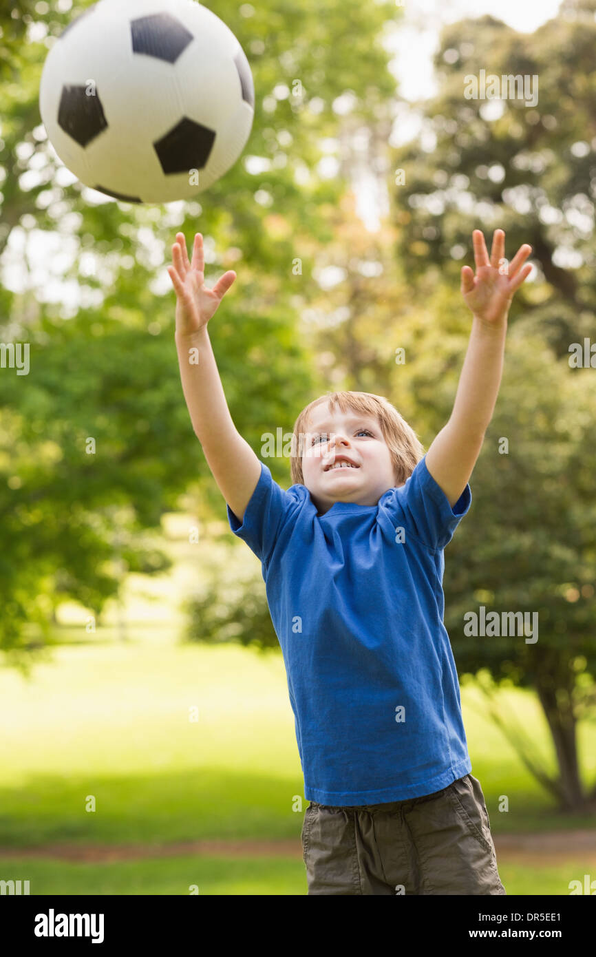 Boy playing ball hi-res stock photography and images - Alamy