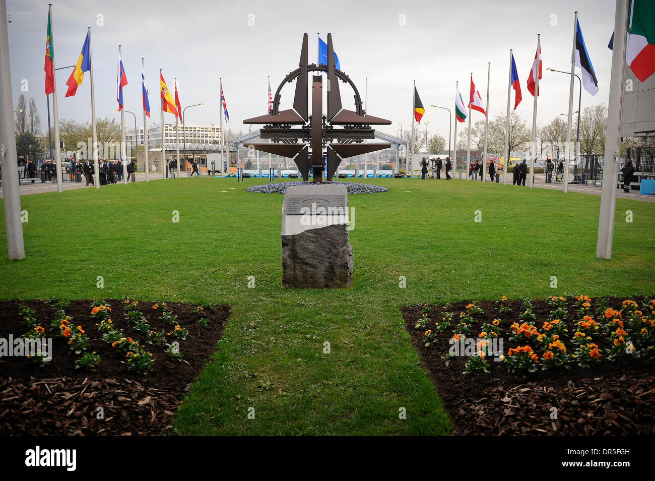 North Atlantic Treaty Organization (NATO) symbol in front of ...
