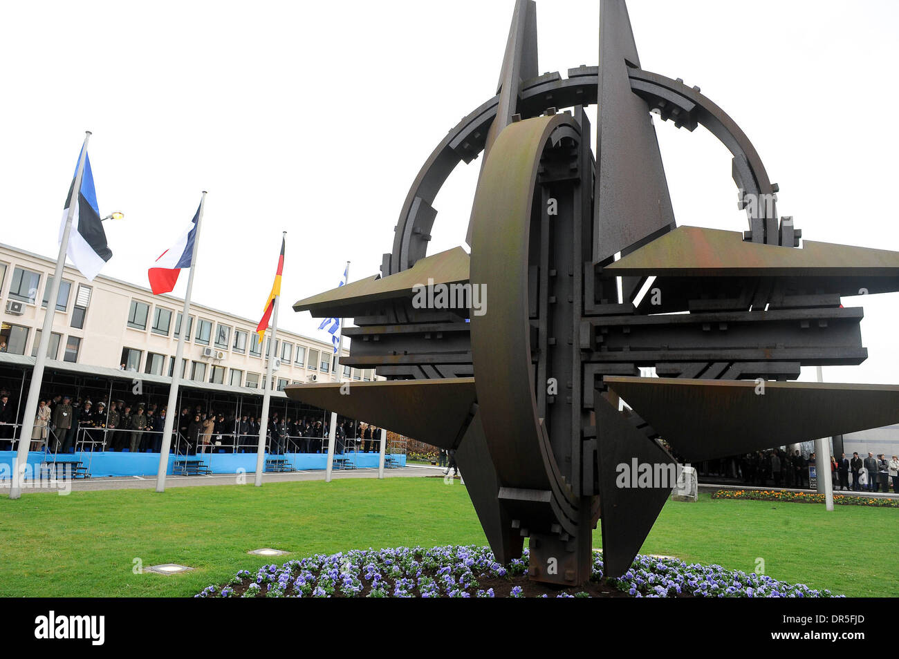 North Atlantic Treaty Organization (NATO) symbol in front of ...