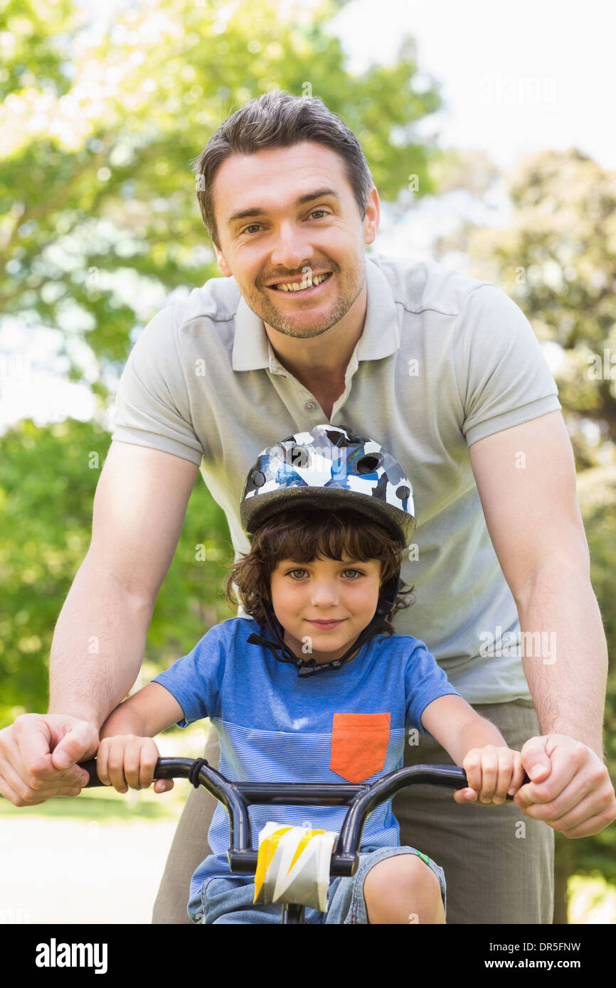 Father son enjoying bicycle hi-res stock photography and images - Alamy