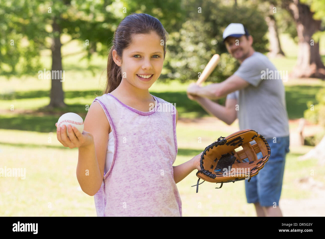 Father and daughter playing baseball Stock Photo - Alamy