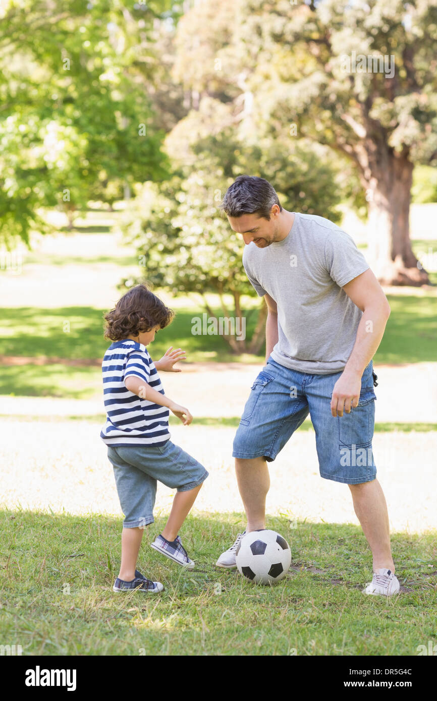 Father and son playing football hi-res stock photography and images - Alamy