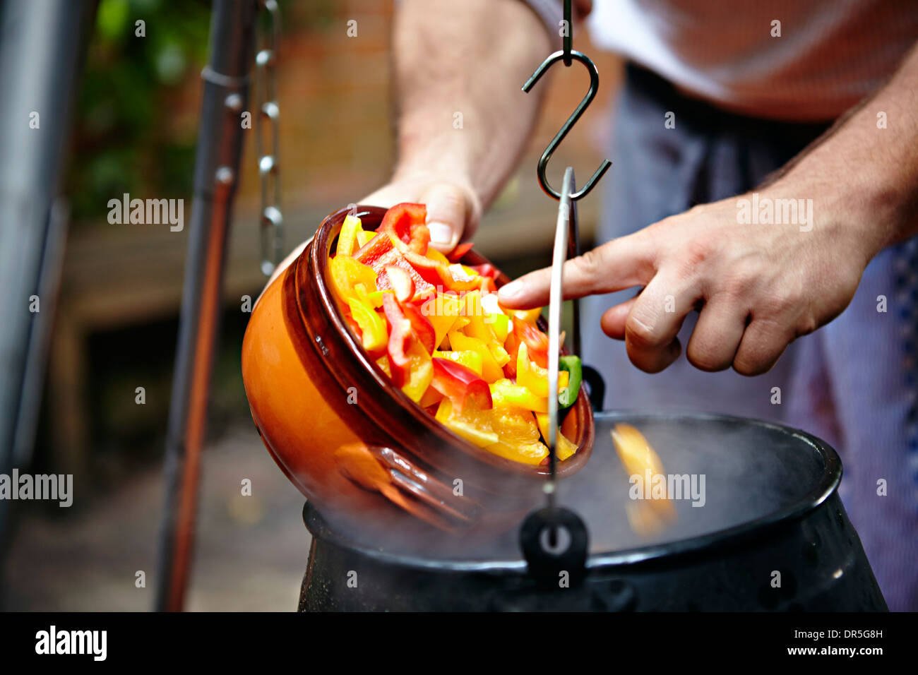 Person Adding Vegetable In Cooking Pot Stock Photo - Alamy