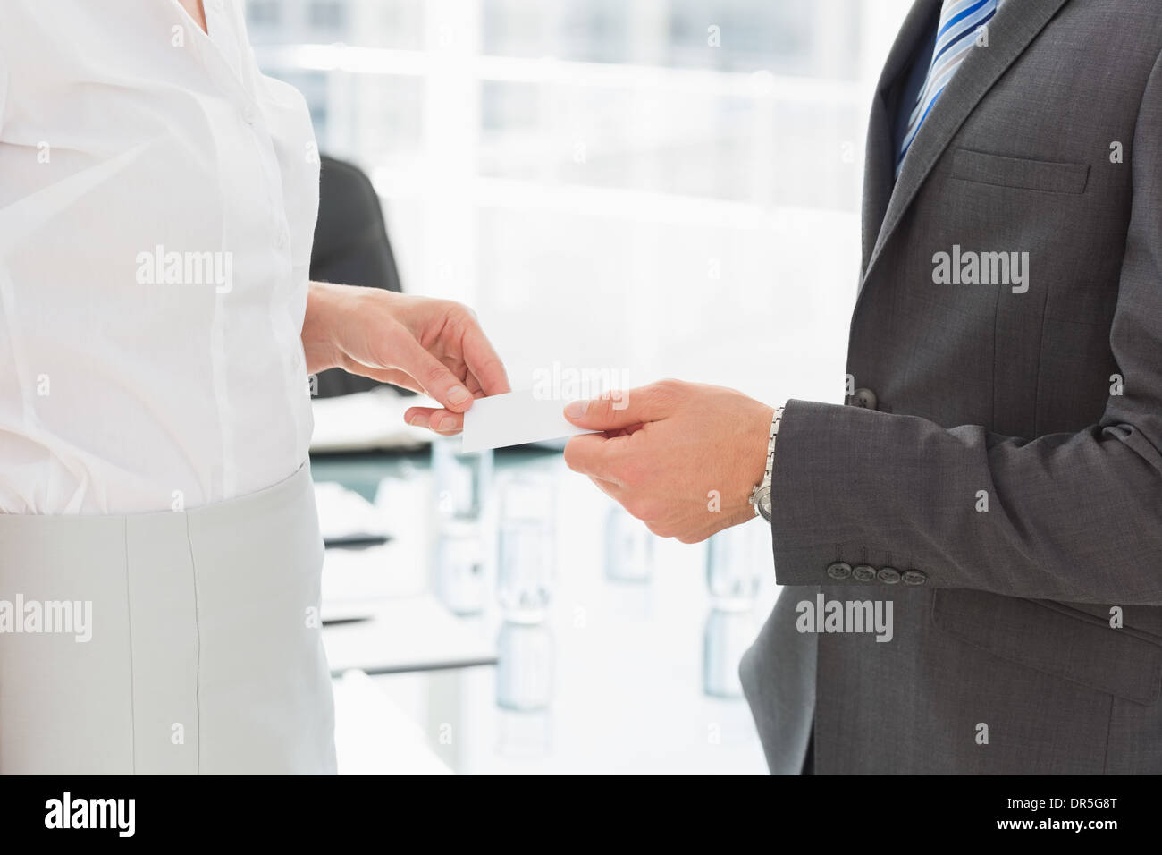 Woman card handing hi-res stock photography and images - Alamy