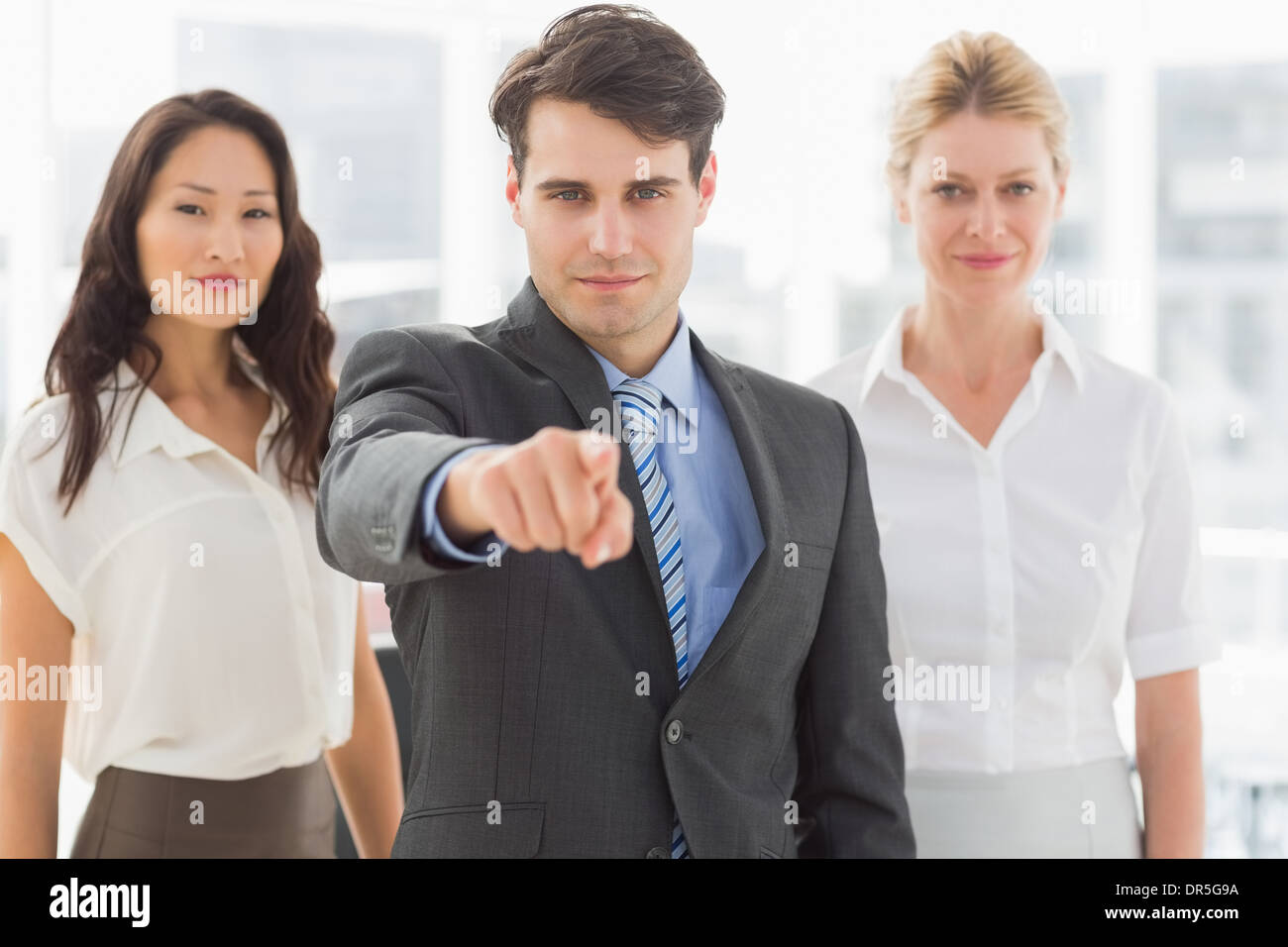 Portrait woman pointing camera in hi-res stock photography and images ...