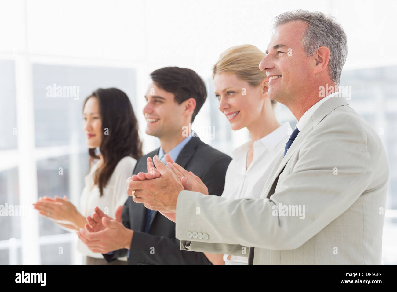 To a standing applause hi-res stock photography and images - Alamy