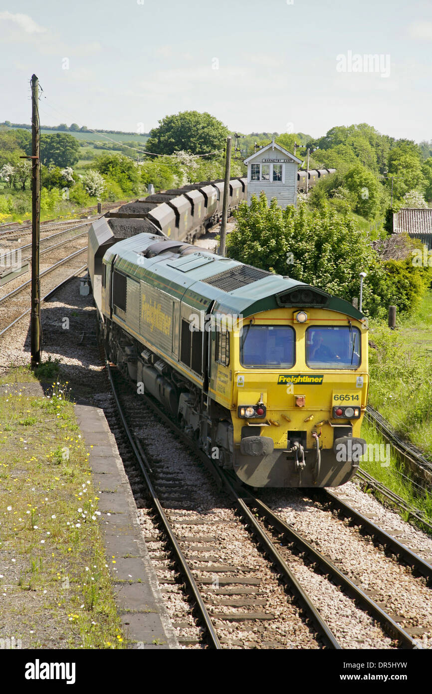 Class 66 diesel locomotive 66514 with train of loaded coal wagons ...