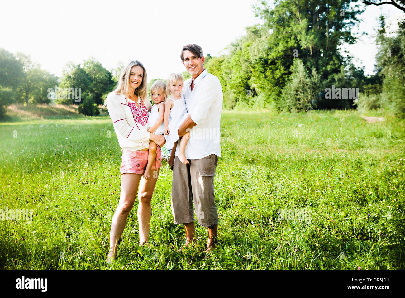 Two girls and their parents hi-res stock photography and images - Alamy