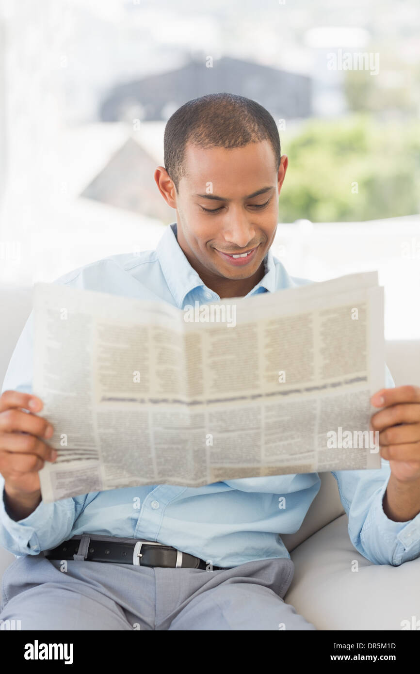Businessman smiling reading information hi-res stock photography and ...