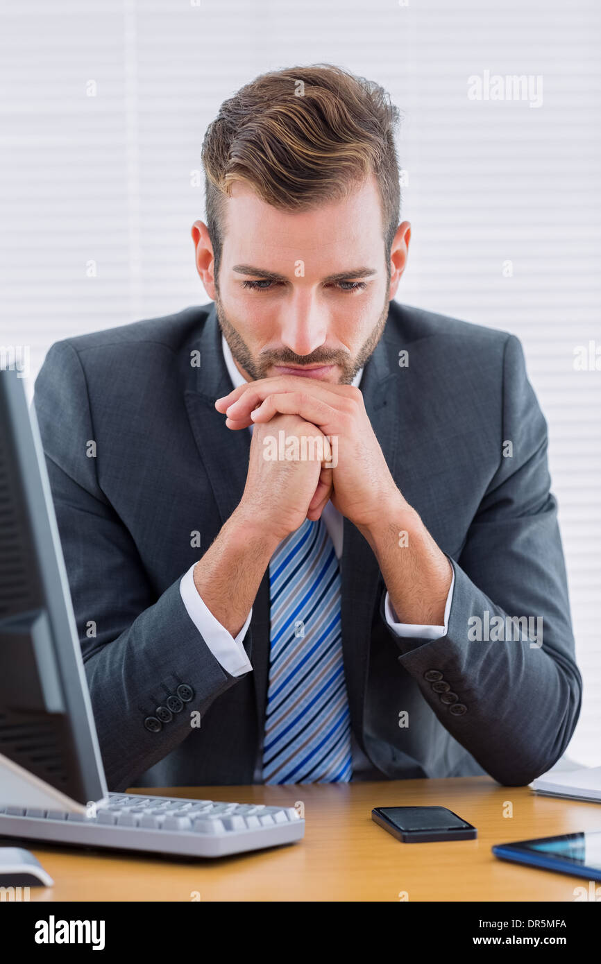 Man office desk sitting down not seated hi-res stock photography and ...