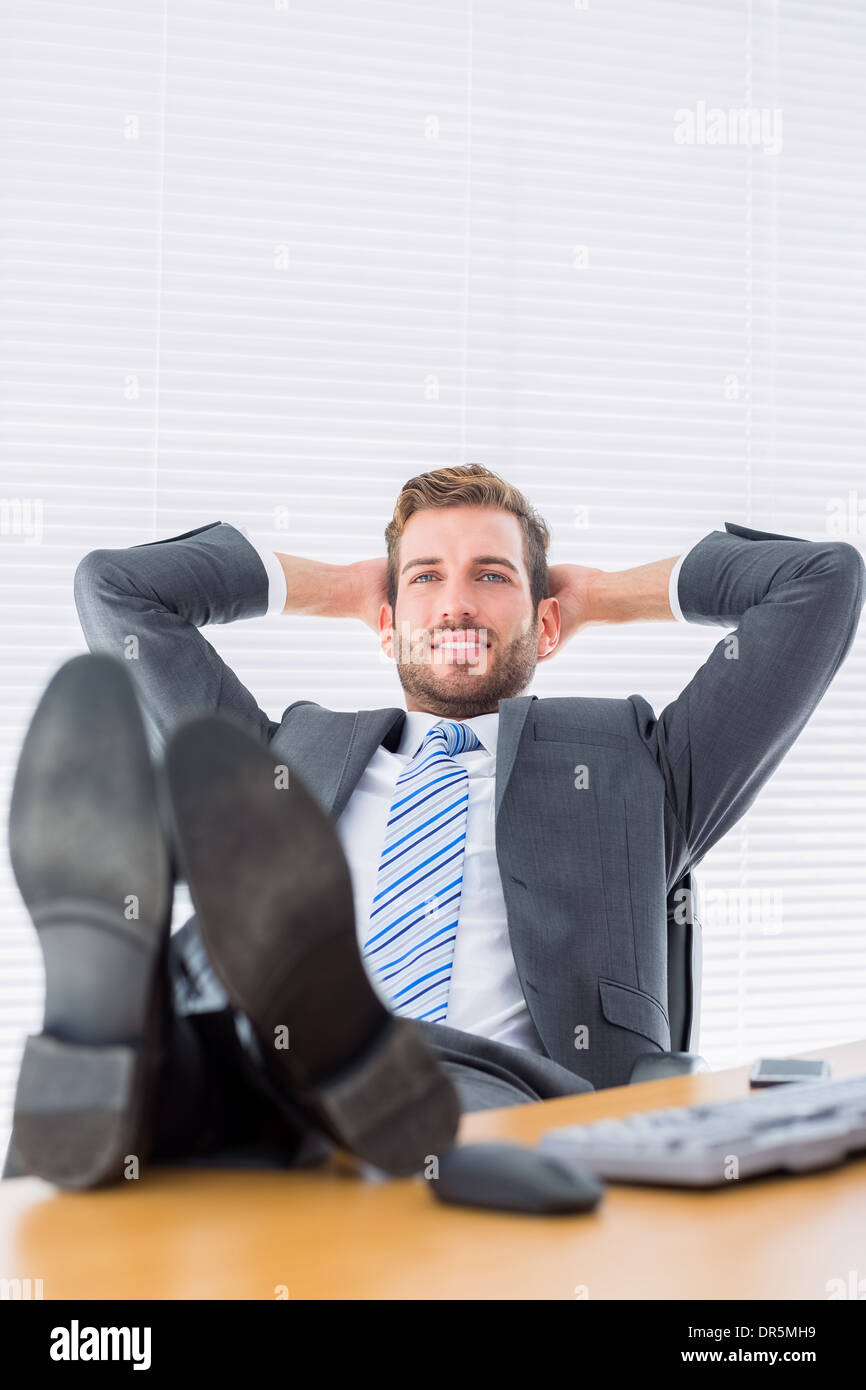 Legs up on desk hi-res stock photography and images - Alamy