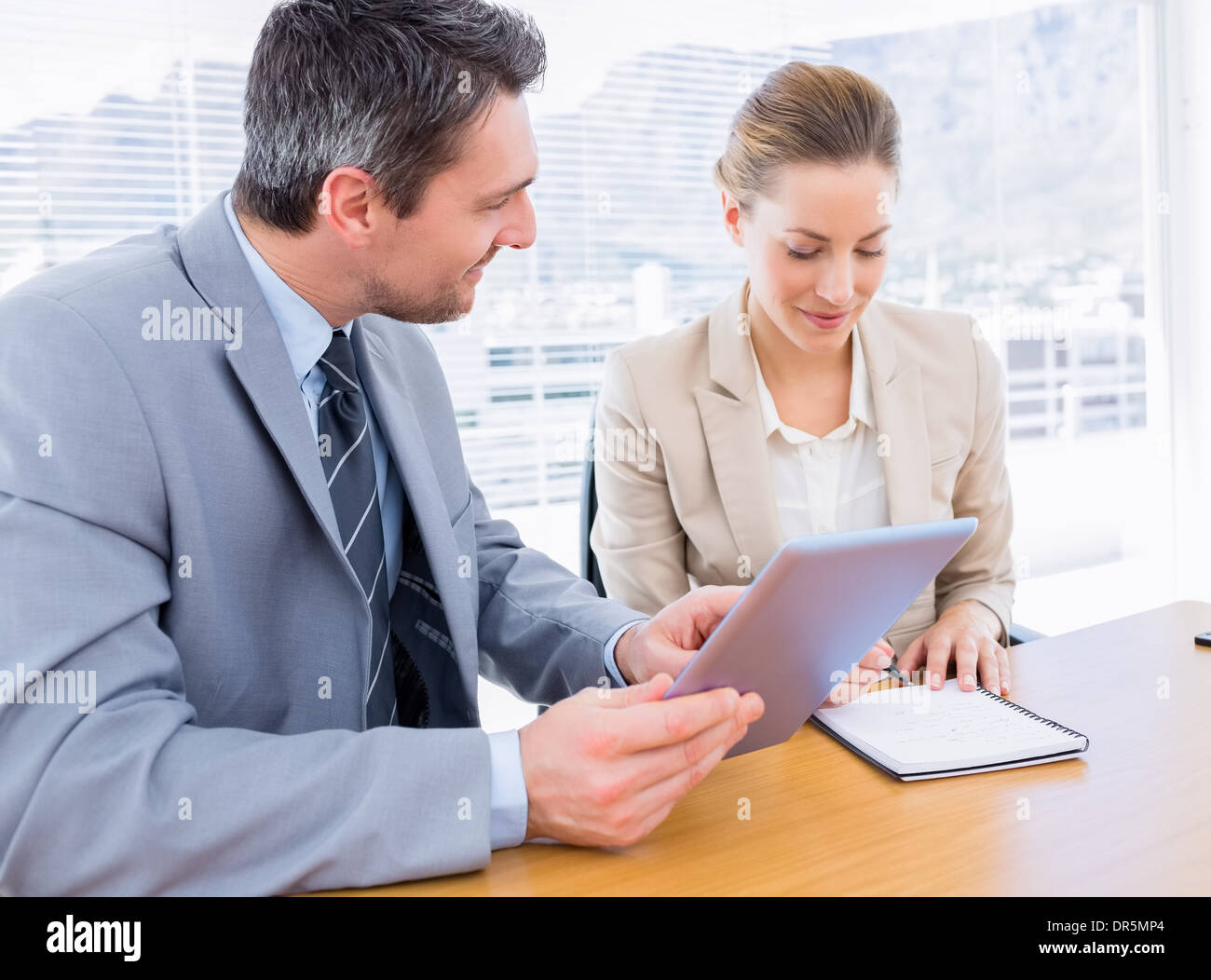 Smartly dressed colleagues in business meeting Stock Photo - Alamy