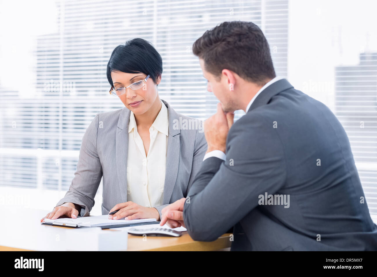 Smartly dressed business man at desk hi-res stock photography and ...