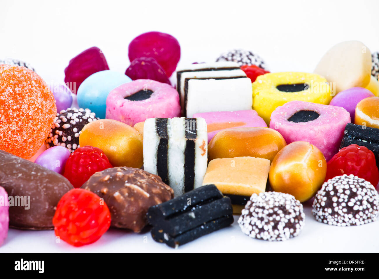 Many candy on white background Stock Photo - Alamy