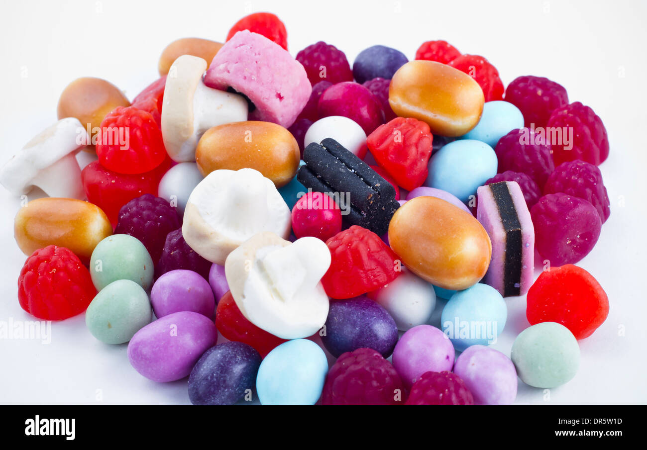 Many candy on white background Stock Photo - Alamy