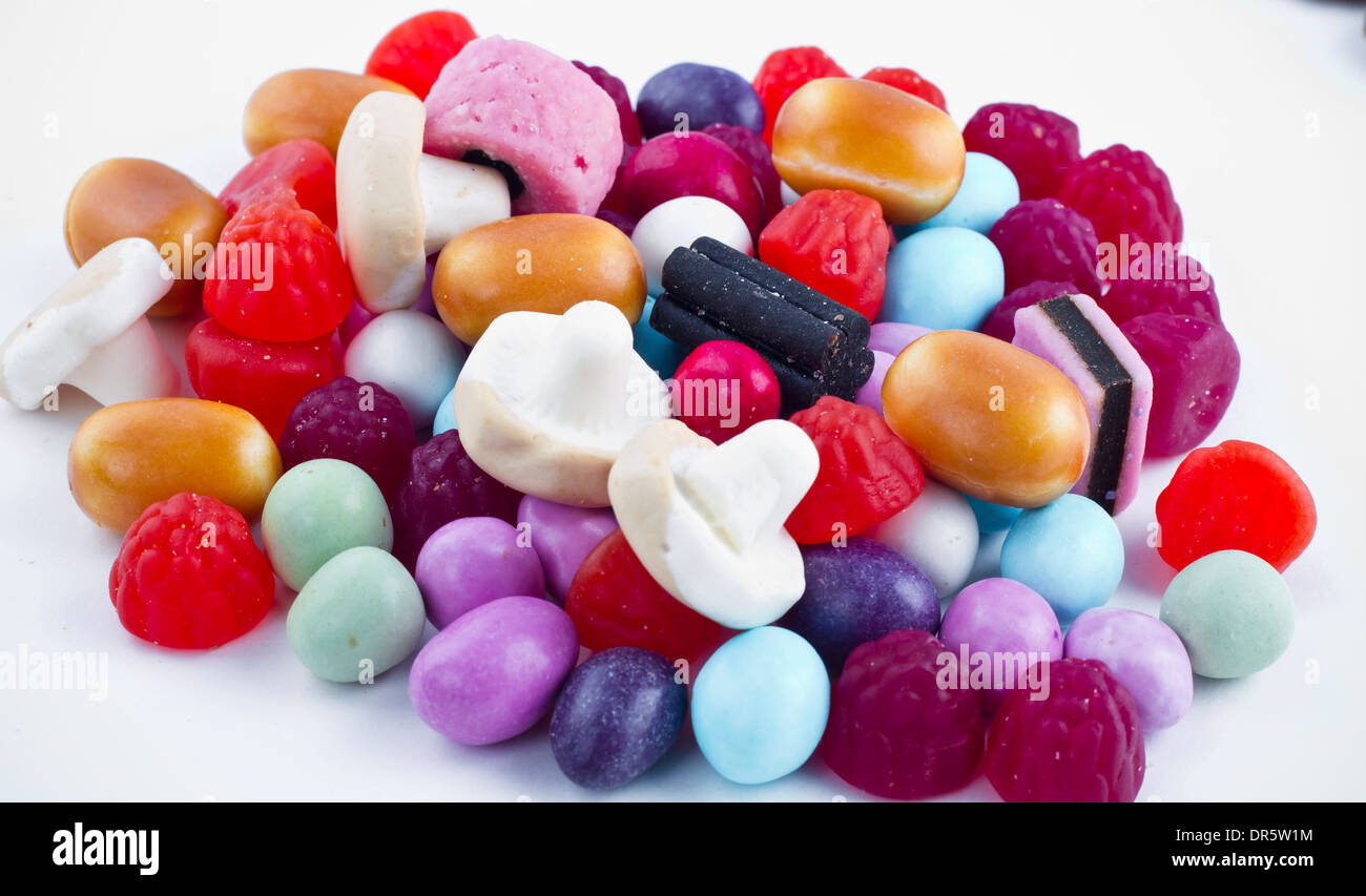 Many candy on white background Stock Photo - Alamy