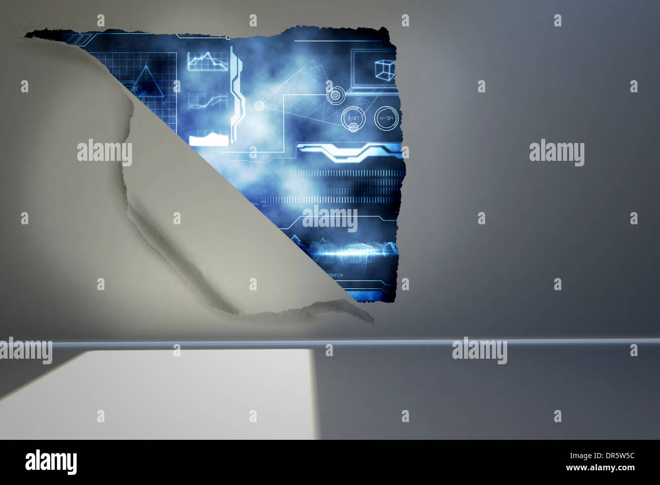 Rip on wall showing technology interface Stock Photo - Alamy