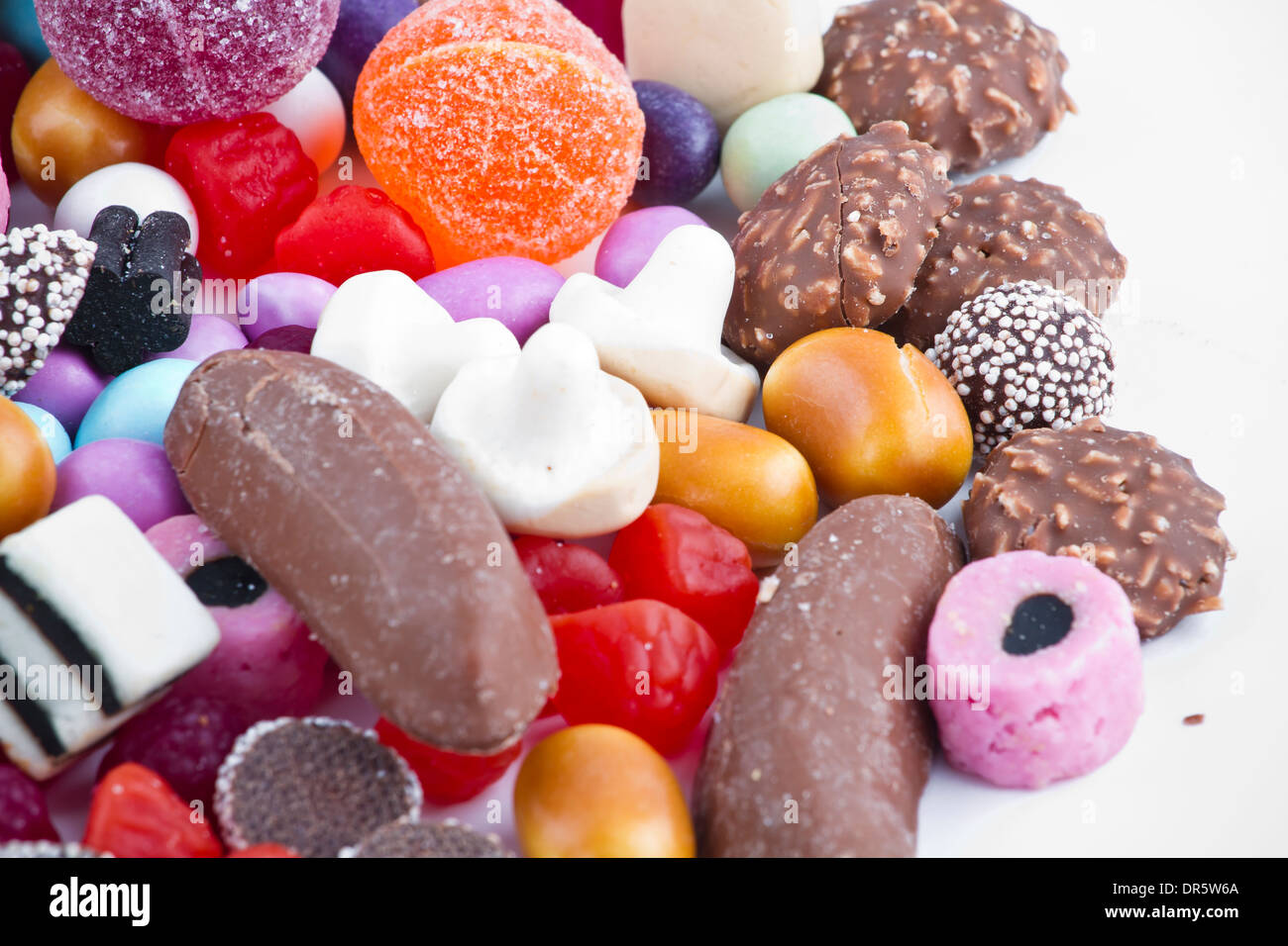 Many candy on white background Stock Photo - Alamy