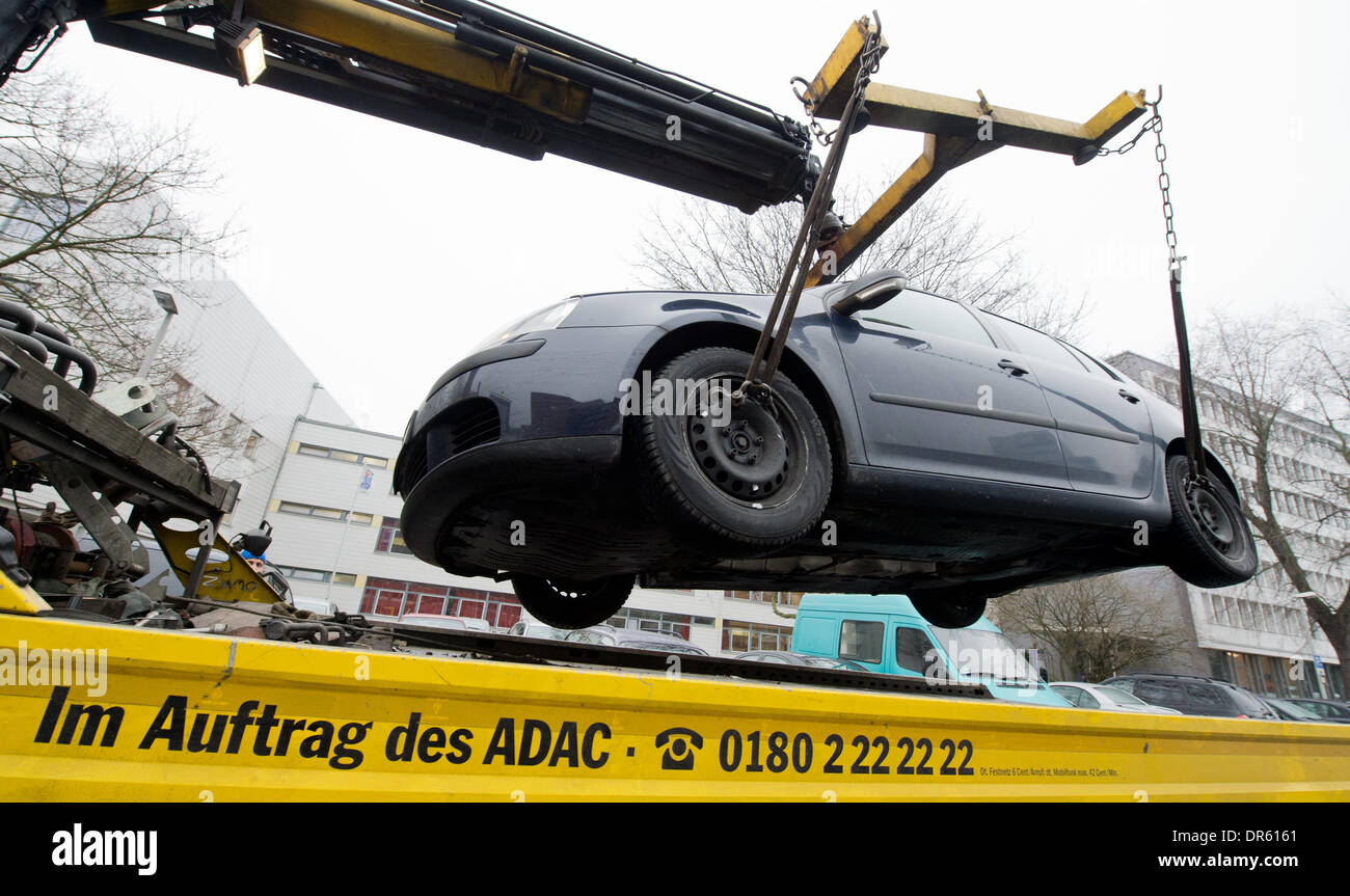 Hanover, Germany. 20th Jan, 2014. A towing company working on behalf of ...
