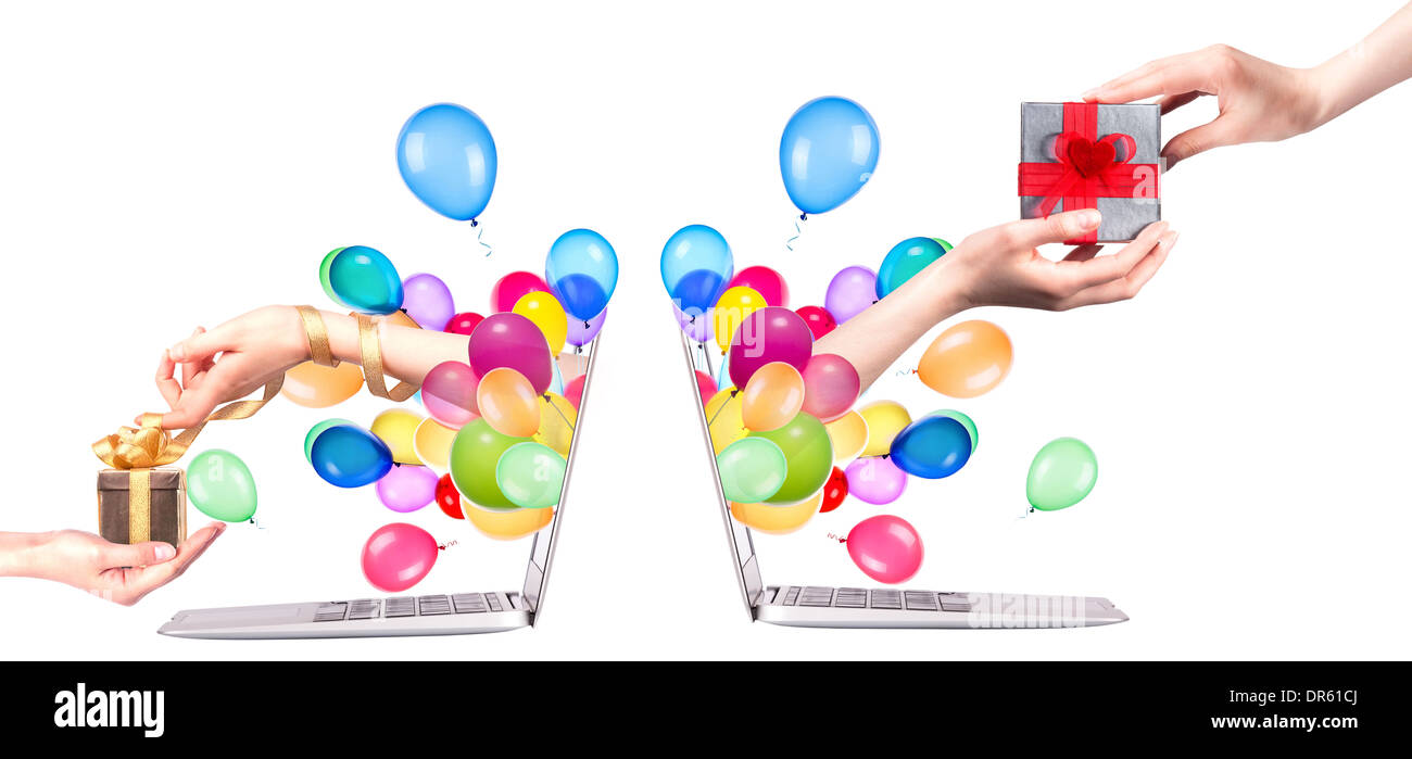 hand with a gift and balloons come out from a screen of a laptop ...
