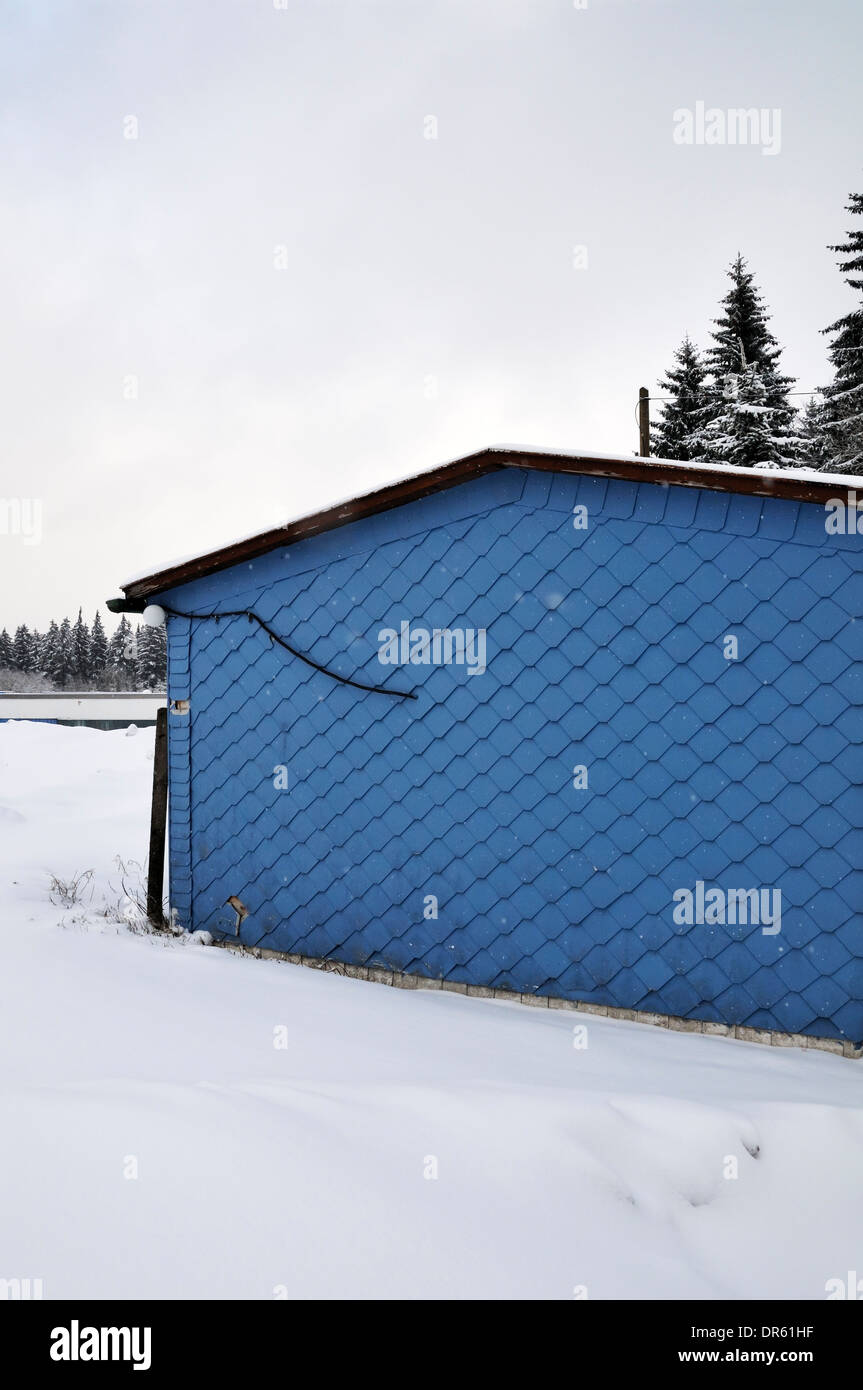Germany, Thurinigia, Oberhof, Blue hut in winter Stock Photo - Alamy