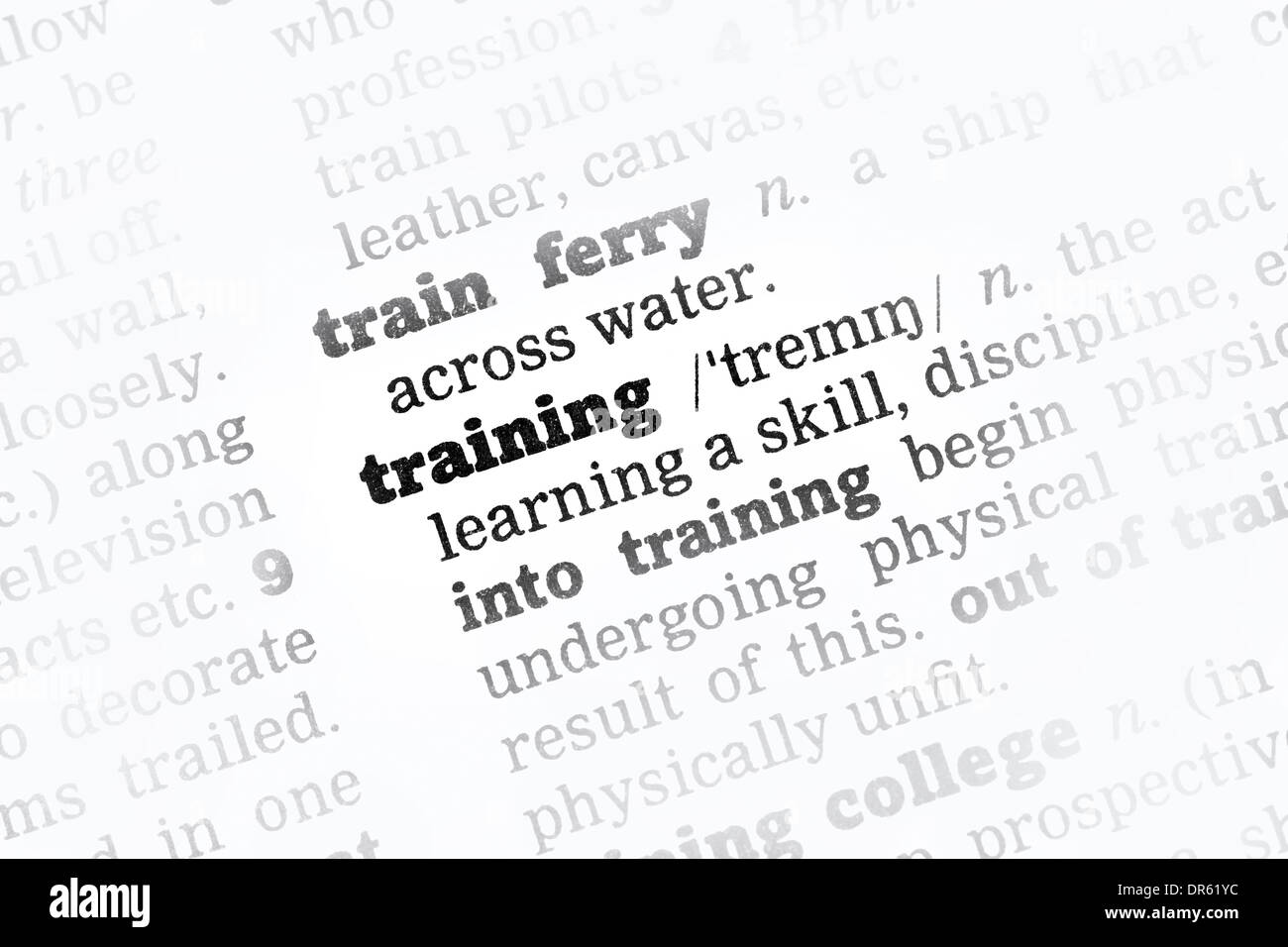 Training Dictionary Definition closeup black and white Stock Photo - Alamy