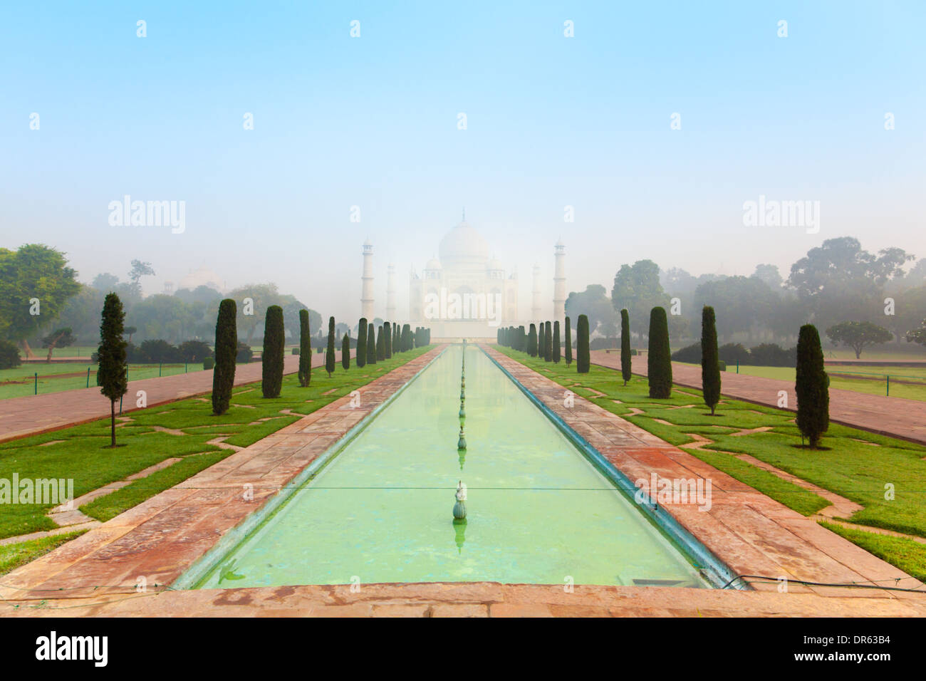 Taj Mahal hidden in pale morning mist Stock Photo - Alamy