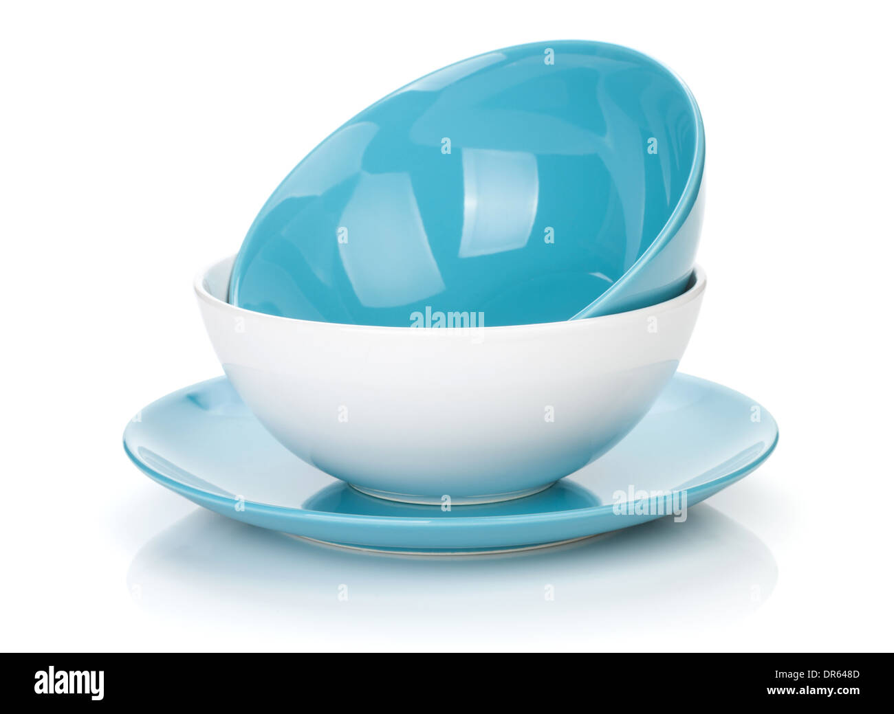 Bowls and plate. Isolated on white background Stock Photo - Alamy