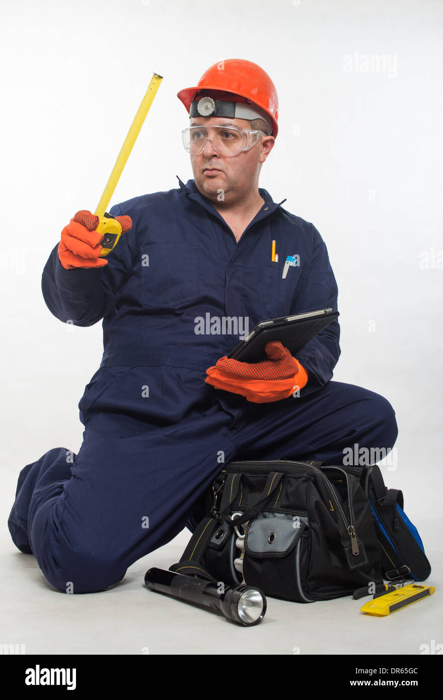 Attractive hispanic construction worker Stock Photo - Alamy