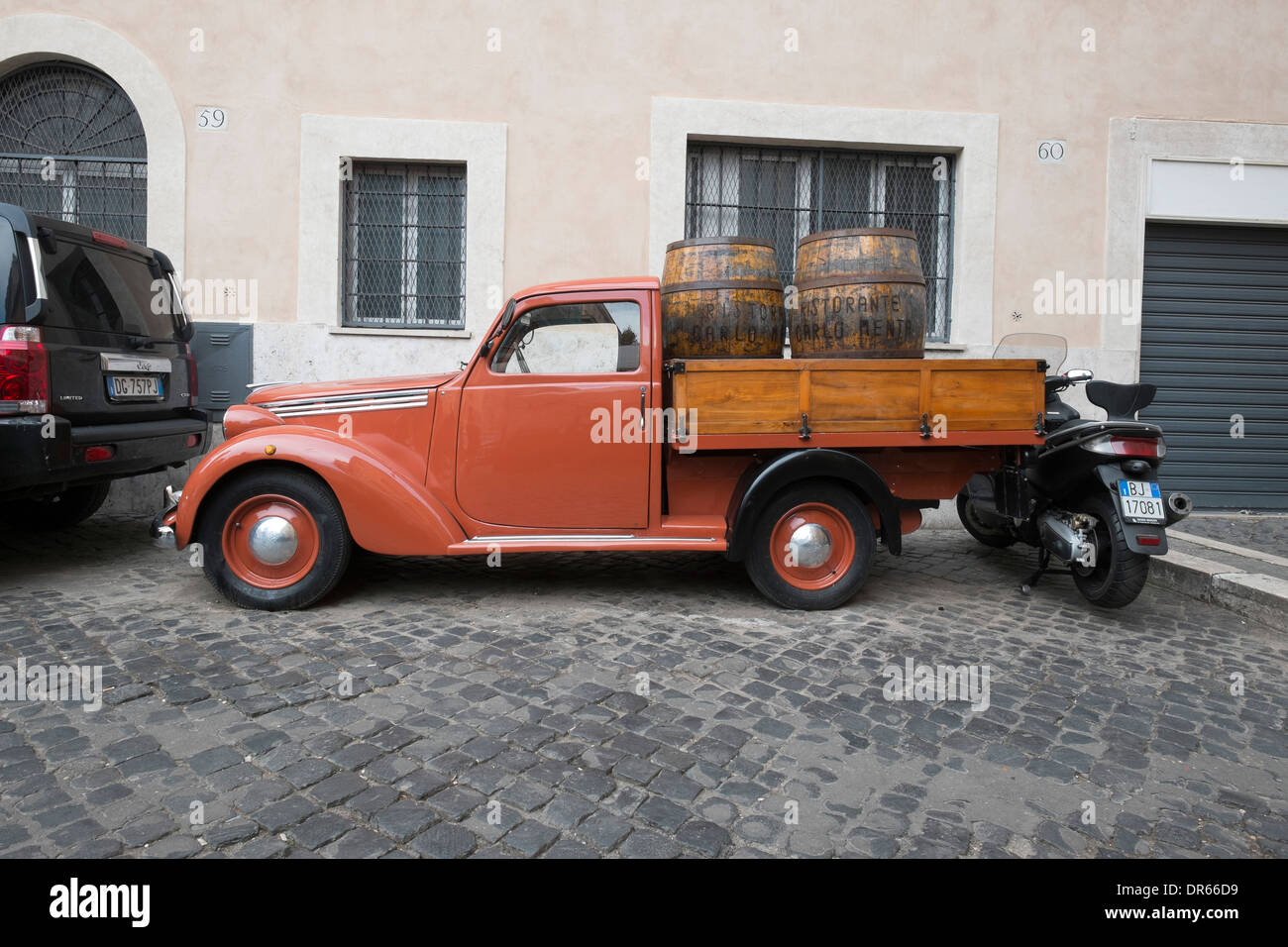 Red truck with wine barrels in Rome, Italy Stock Photo - Alamy