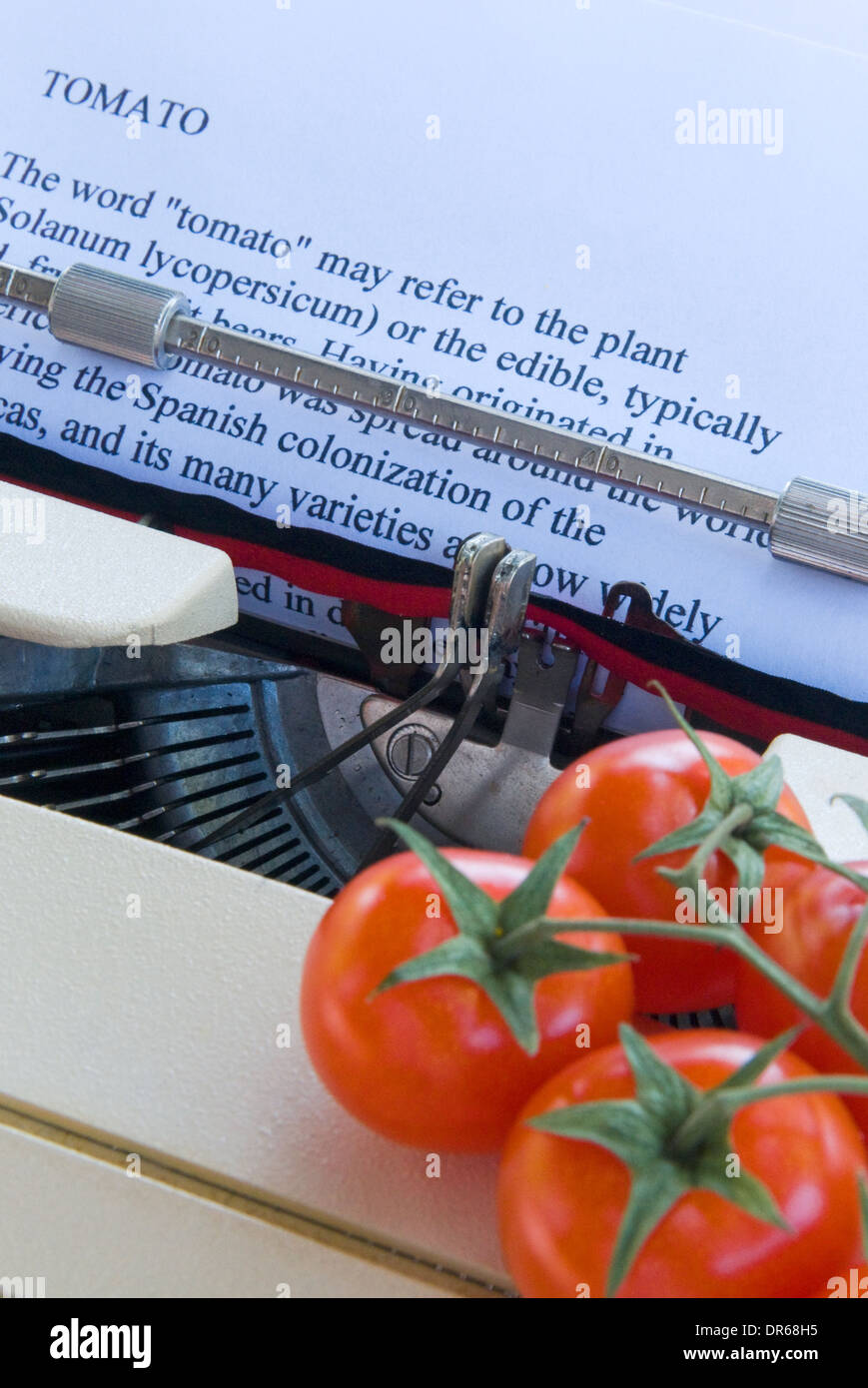 Tomatoes and typewriter Stock Photo - Alamy