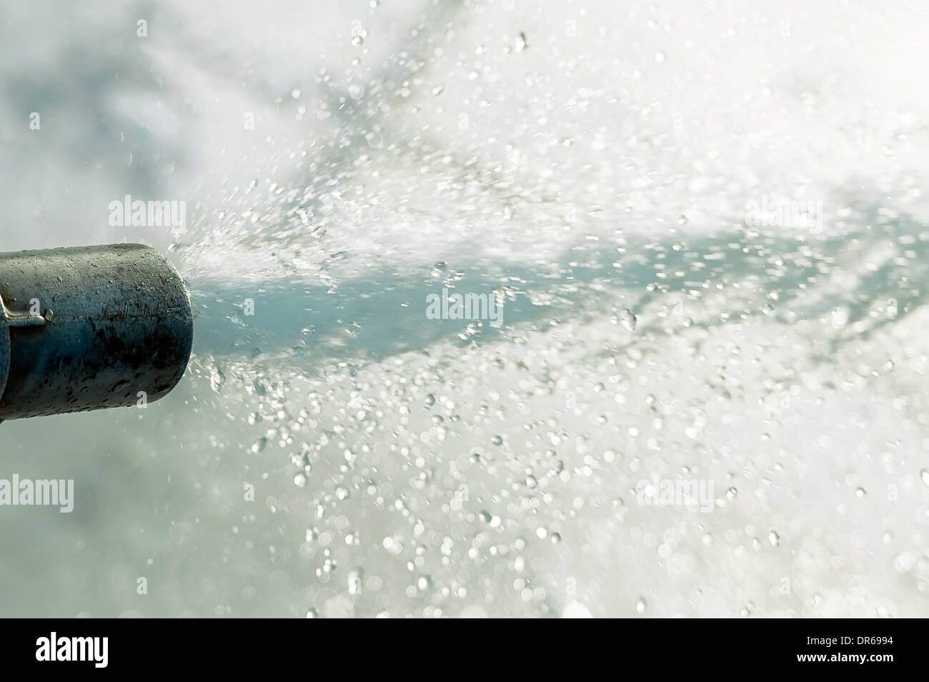 Fireman hose spray hi-res stock photography and images - Alamy