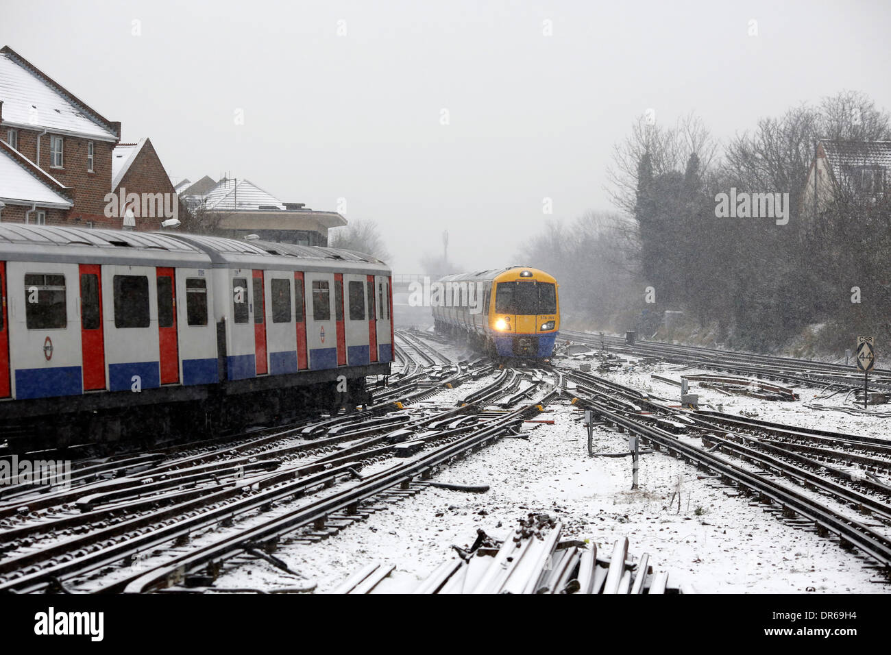 London underground and underground trains in the snow in Richmond Park ...