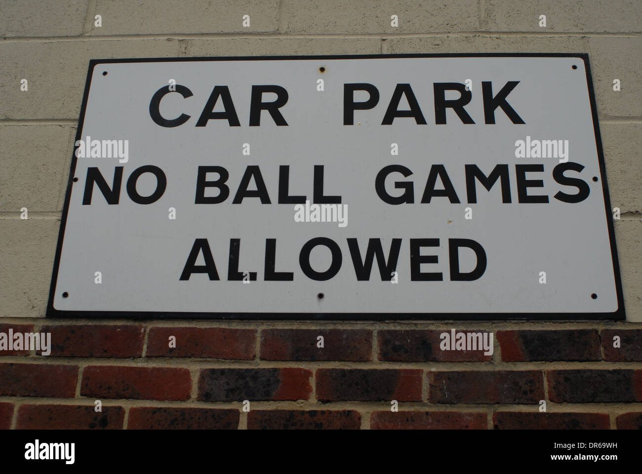 Sign on building saying car park no ball games allowed Stock Photo - Alamy