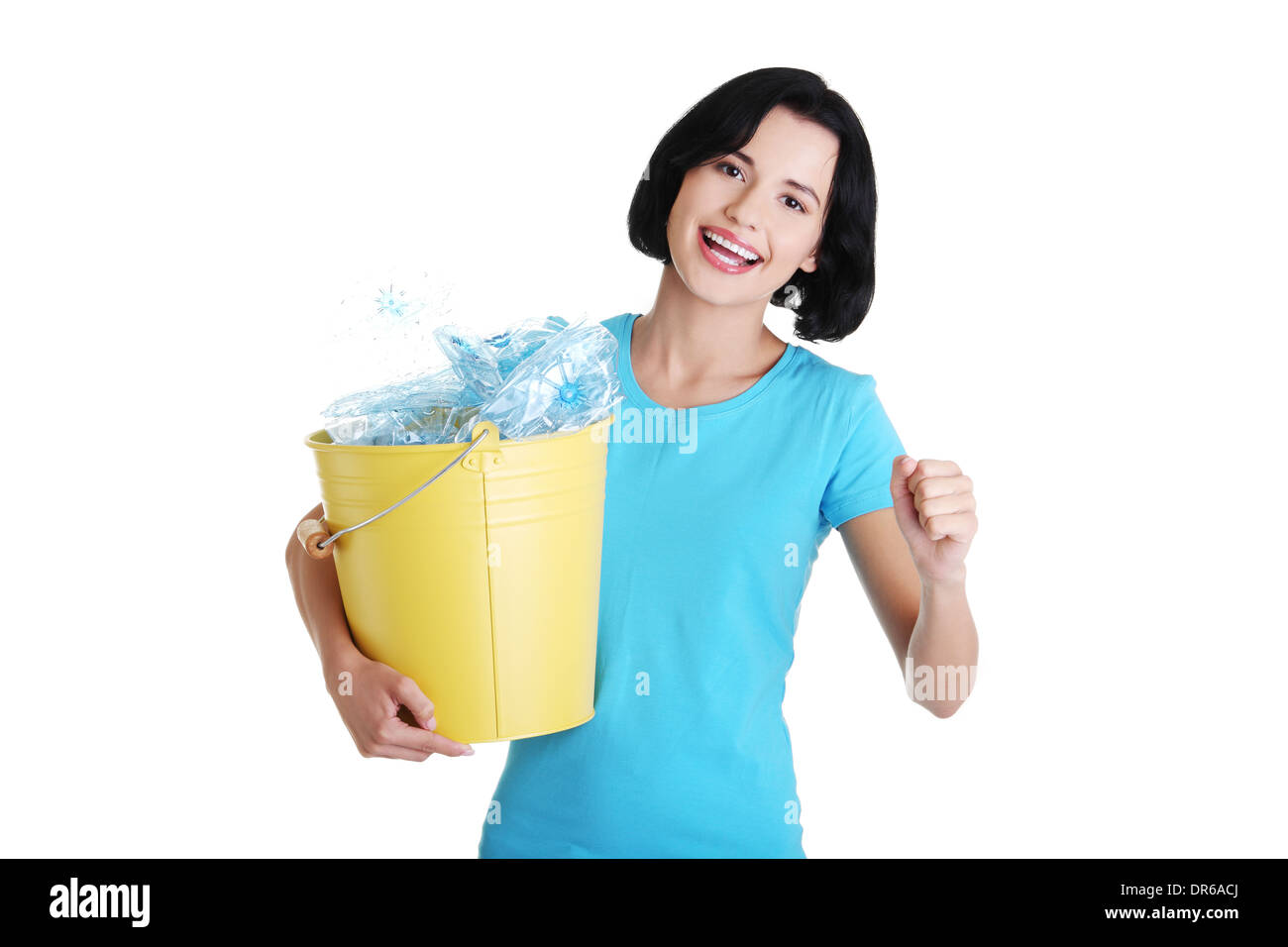 Beautiful young woman holding recycling bin isolated on white ...