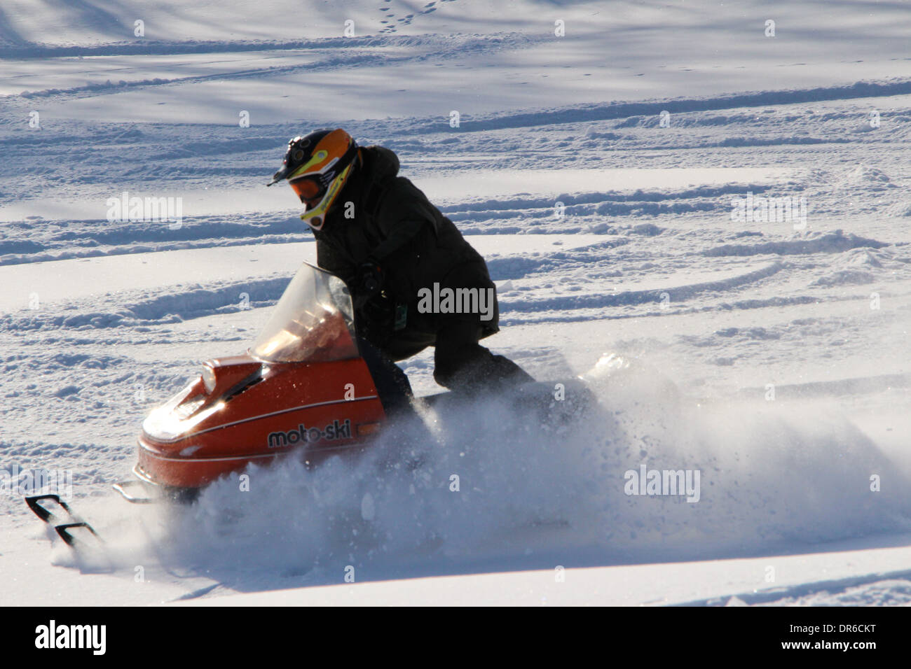 A man rides a snowmobile in Northern Quebec Stock Photo - Alamy