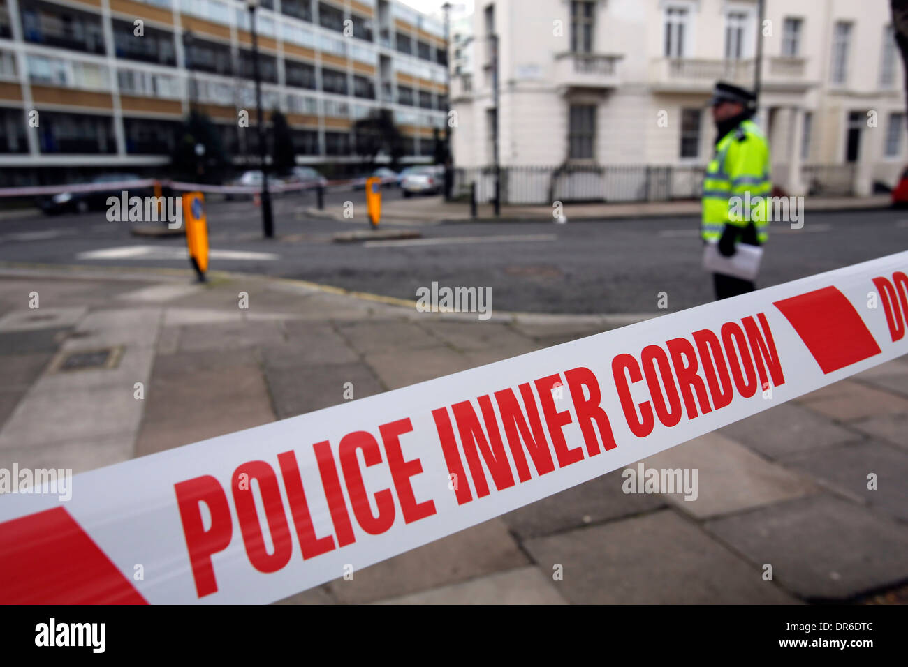 Police forensic in a cordon at a crime scene in Lupus Street Pimlico ...